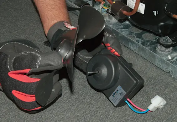 How to replace the condenser fan motor in a top-freezer refrigerator ...