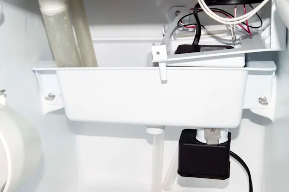 How to replace a freestanding ice maker recirculation pump | Repair guide