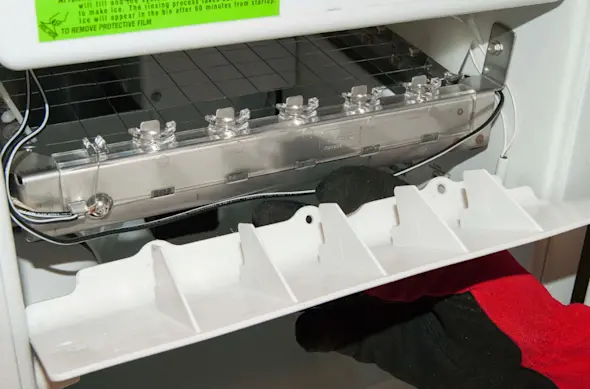 How to replace a freestanding ice maker cutter grid | Repair guide
