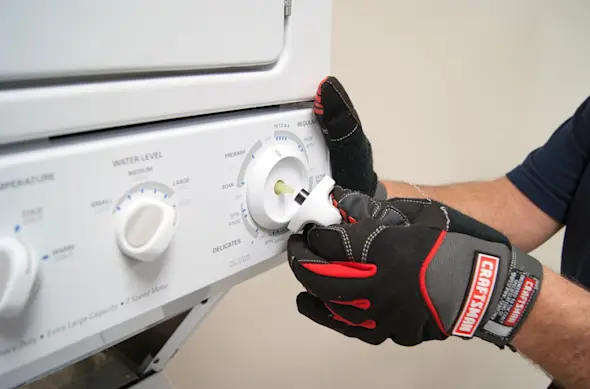How to replace a laundry center washer timer | Repair guide
