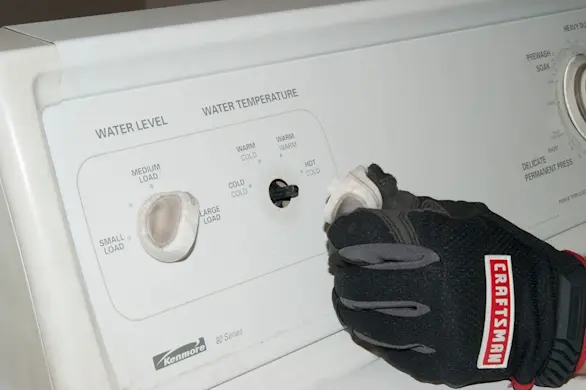 How to replace the water temperature switch on a direct-drive top-load ...