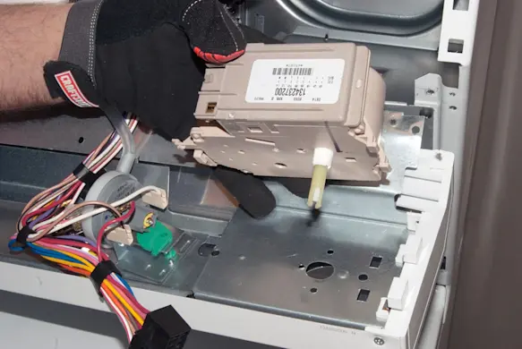 How to replace a laundry center washer timer | Repair guide
