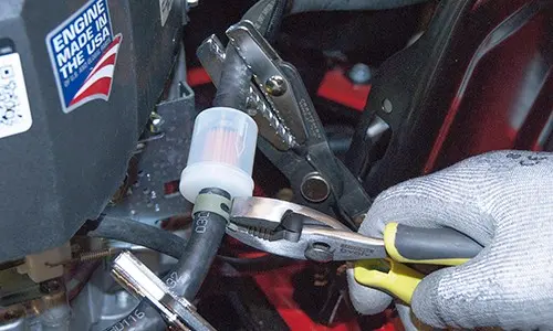 How to replace a riding lawn mower fuel filter | Repair guide