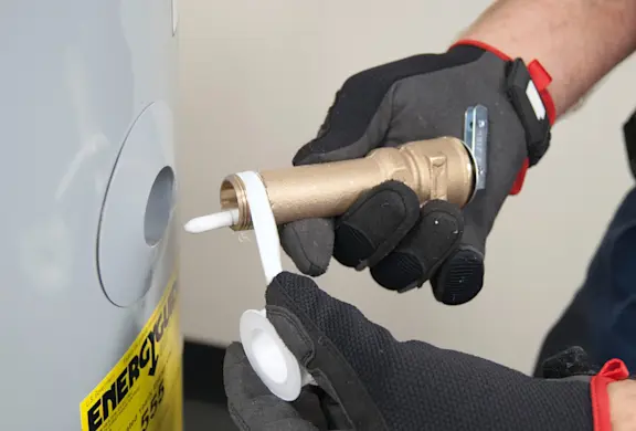 How to replace a water heater temperature and pressure (T&P) relief ...