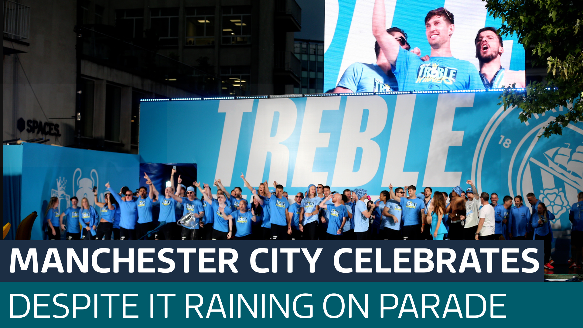 Thousands turn out for Man City's victory parade despite heavy rain ...