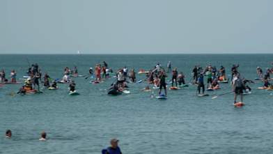 'Paddle-out protest' staged against sewage discharges in rivers and ...