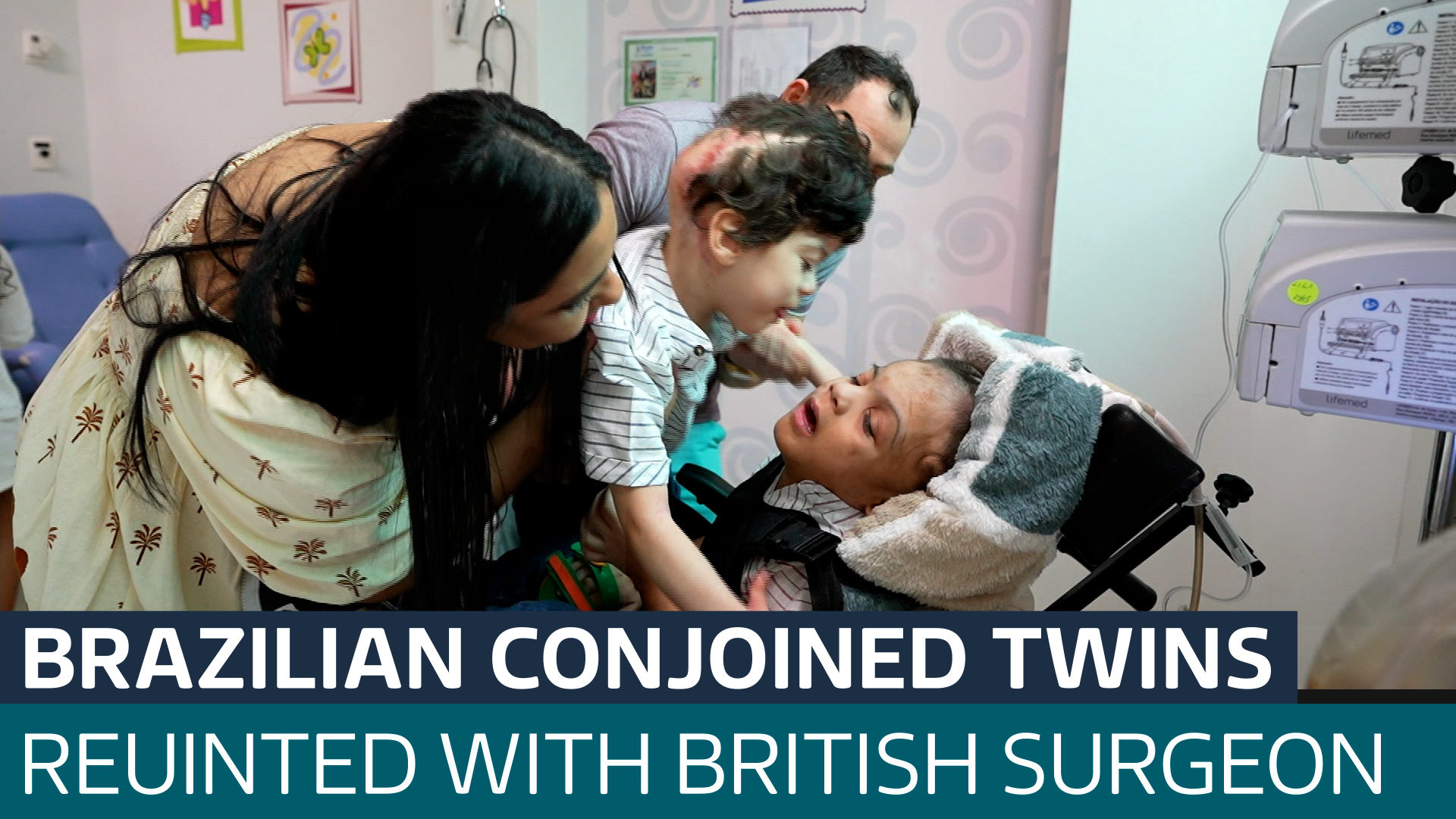 British surgeon reunites with conjoined twins he successfully separated ...