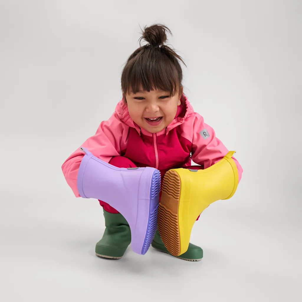 Let your kid experience total barefoot bliss in the rain - with dry feet!