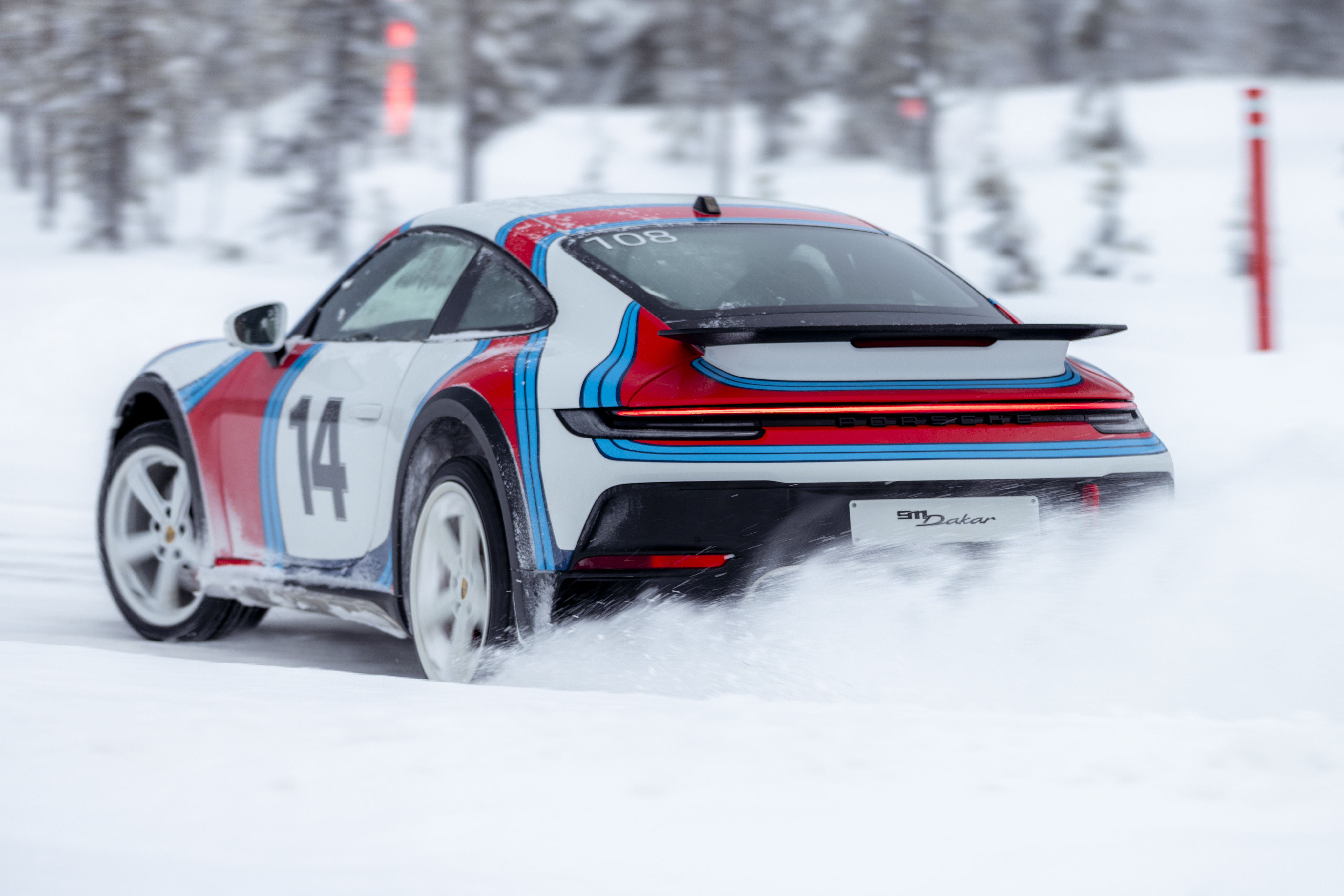 Red Porsche Snow Drift