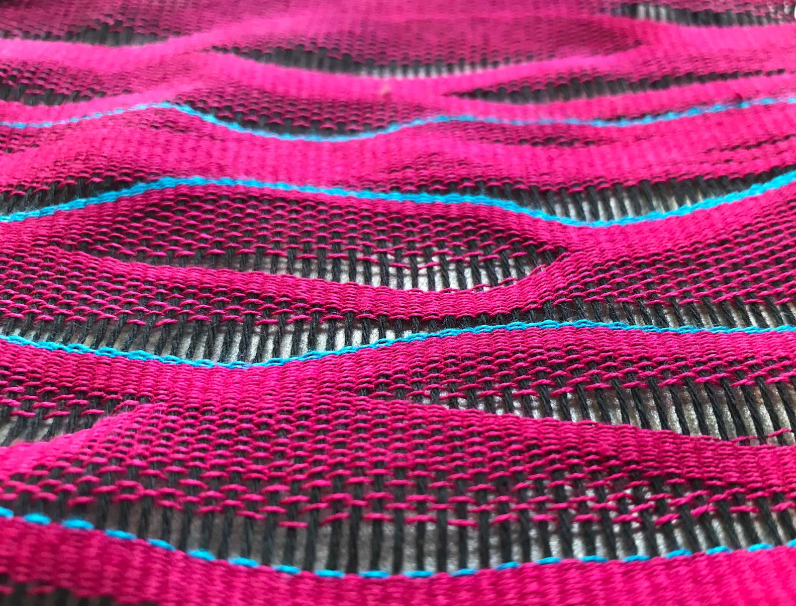 Weaving with a Wave Stick | Handwoven