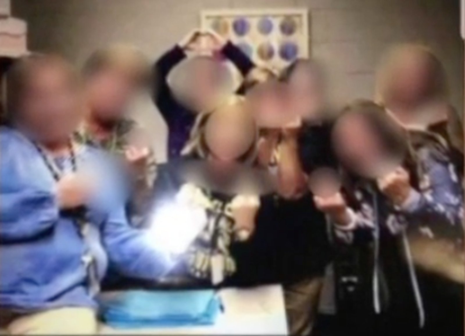 Photo of Teachers Giving the Middle Finger Goes Viral | CafeMom.com