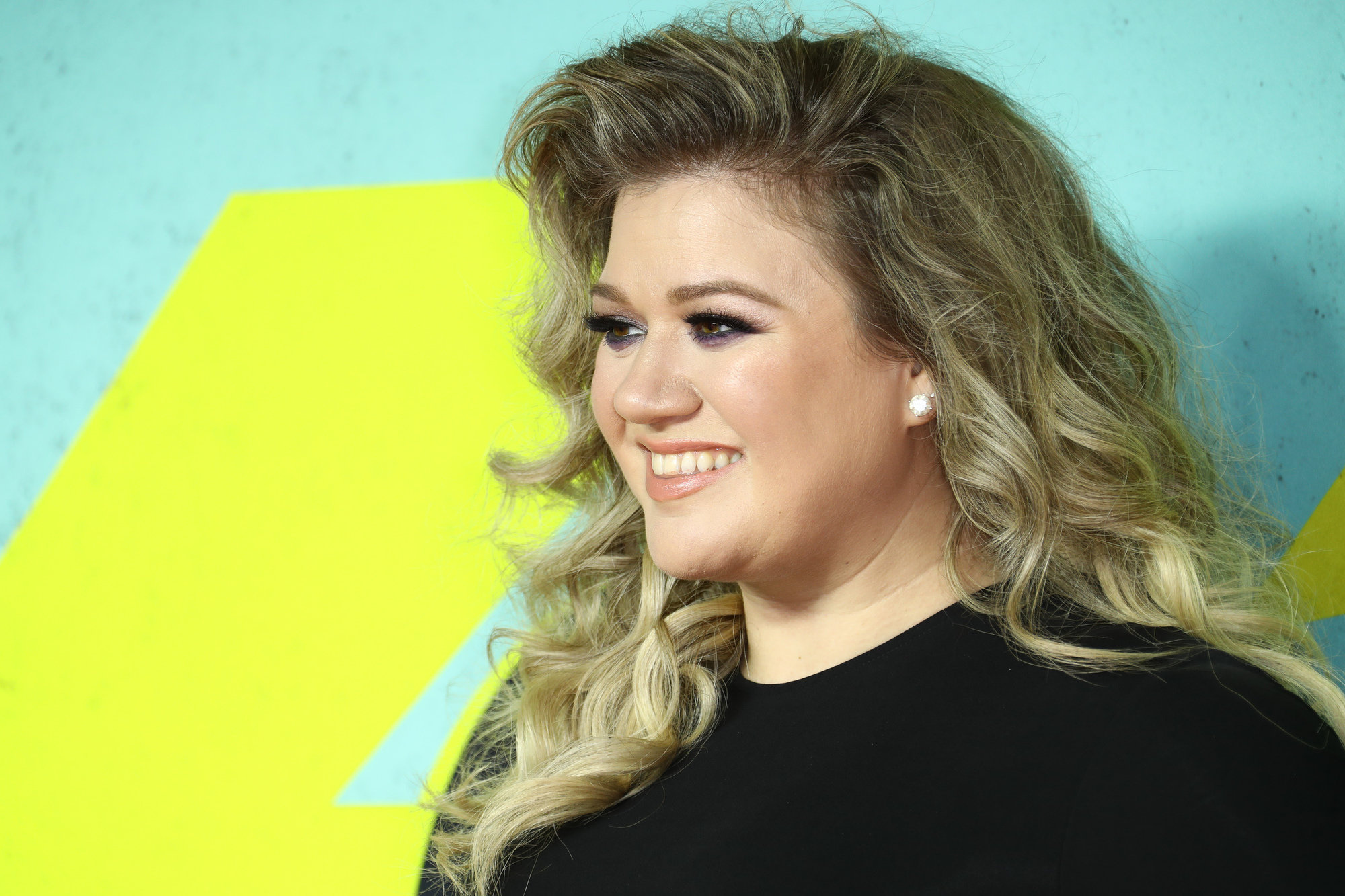 Kelly Clarkson's epic style evolution in 28 photos | CafeMom.com