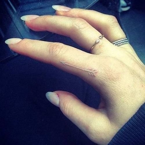 These white ink finger tattoos are the perfect tiny ink | CafeMom.com