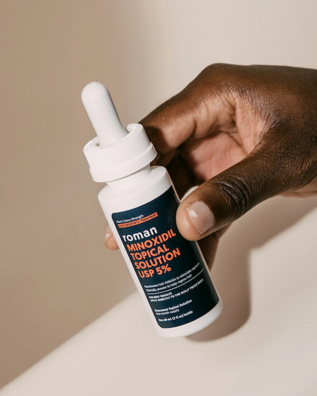 Buy Minoxidil (Generic Rogaine) for Hair Loss Online | Roman