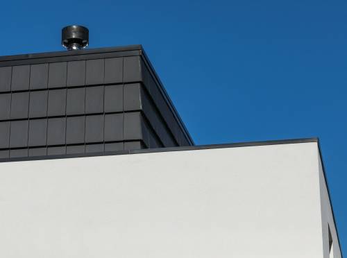 Sistema Tectum® Pro com telha Lógica® Plana em duas moradias no Porto