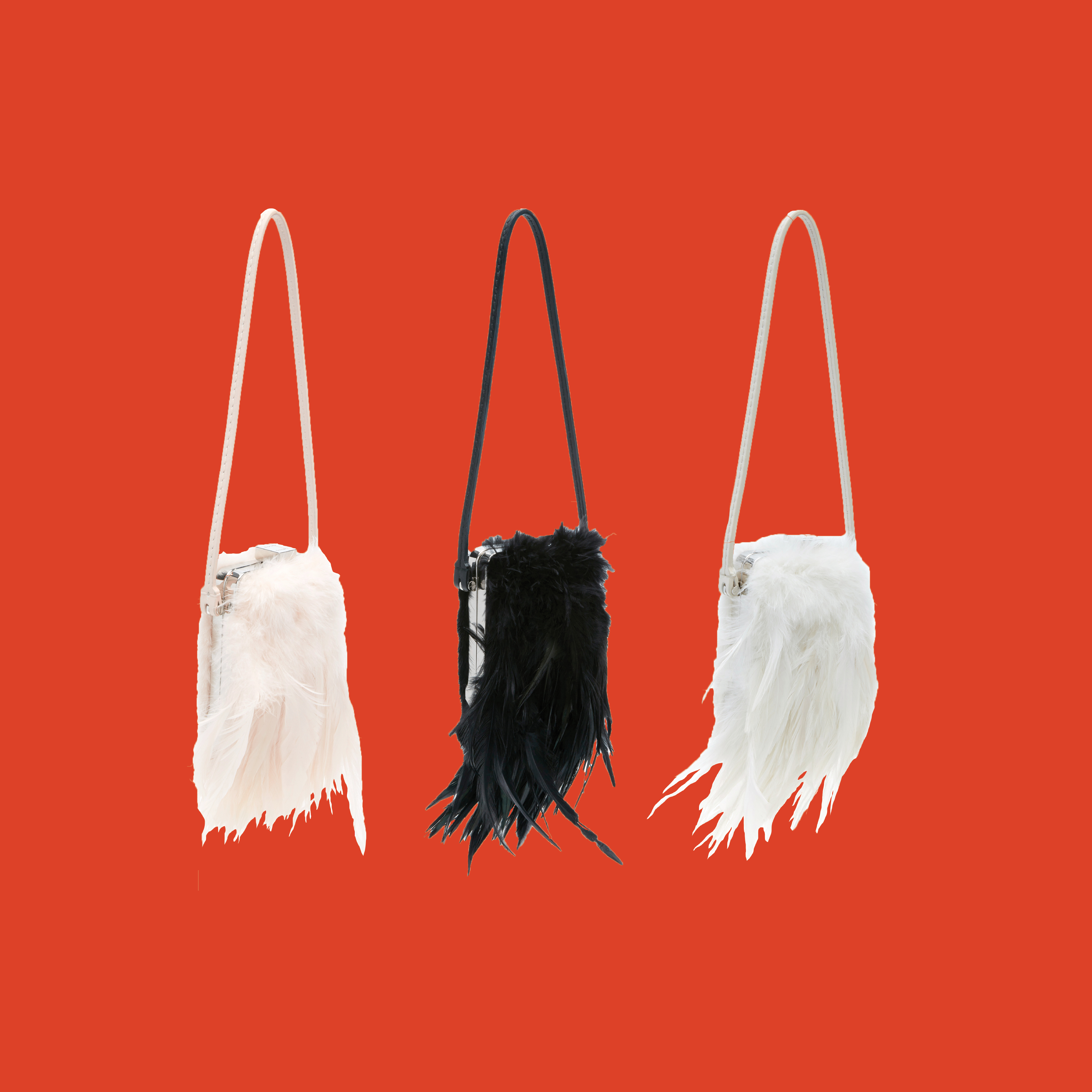 Proenza Schouler's Mini Frame Feathered Clutch - Minnie Muse