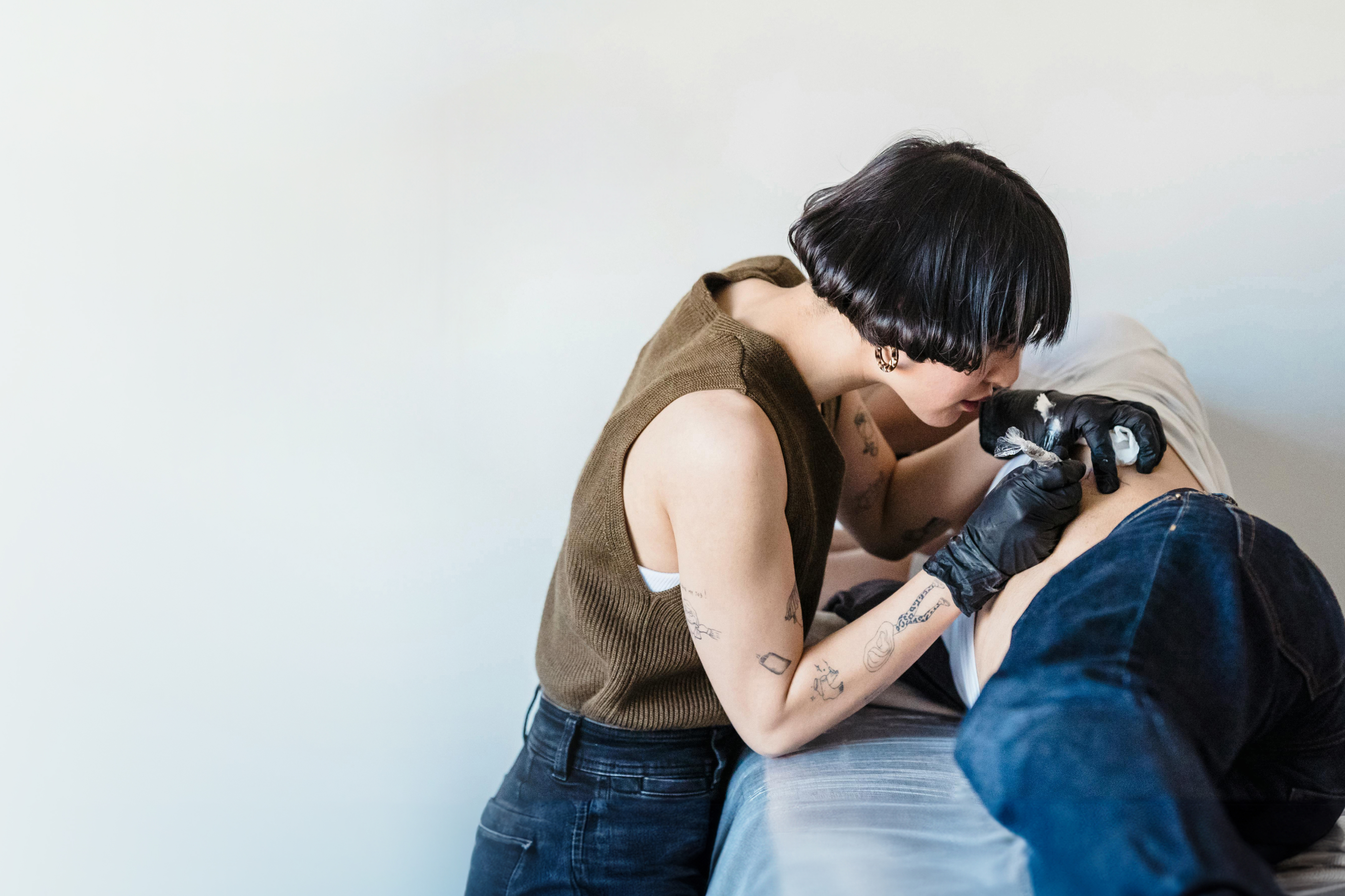 Best Tattoo & Piercing Studio Software for Booking, Scheduling & Payments | Mangomint