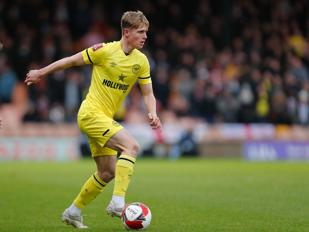 Fin Stevens reacts after signing new contract | Brentford FC