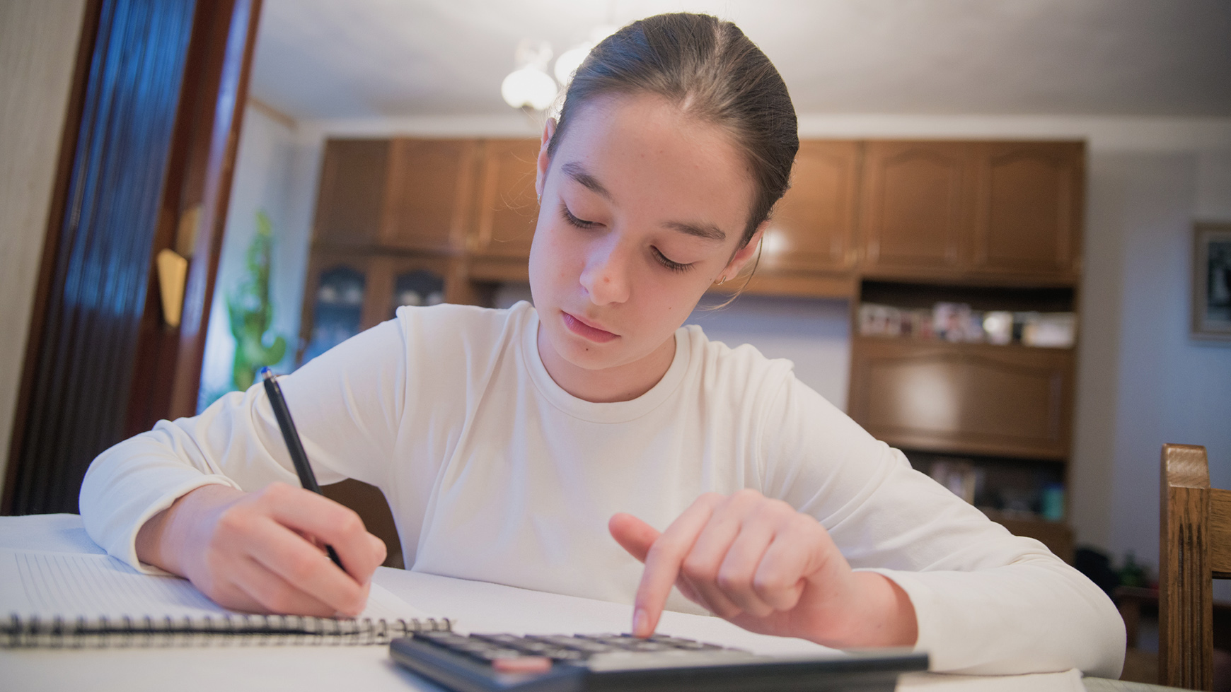 Will using a calculator keep my child from getting better at math?