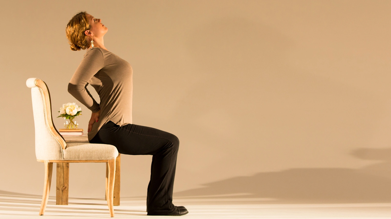 From Mindless Scrolling to Mindful Sitting: 5 Poses to Do While You Wait