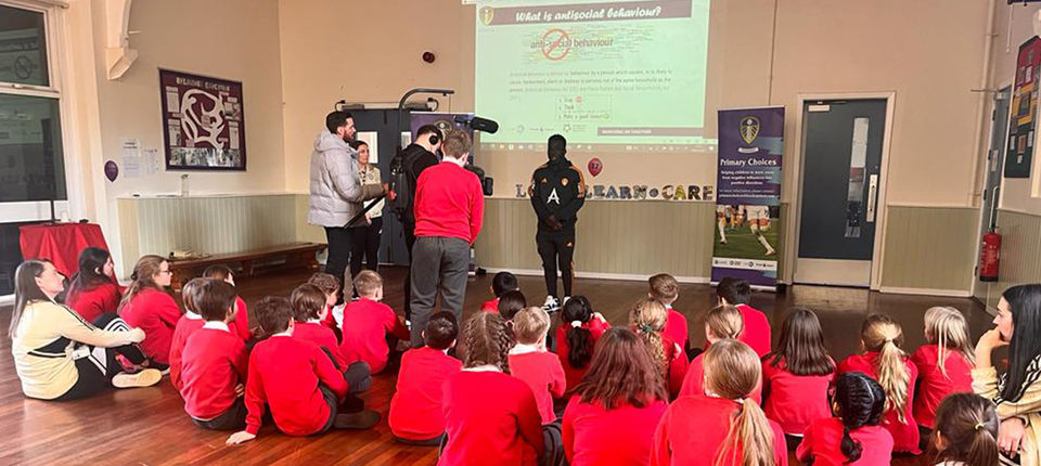Willy Gnonto helps students make positive choices - Leeds United
