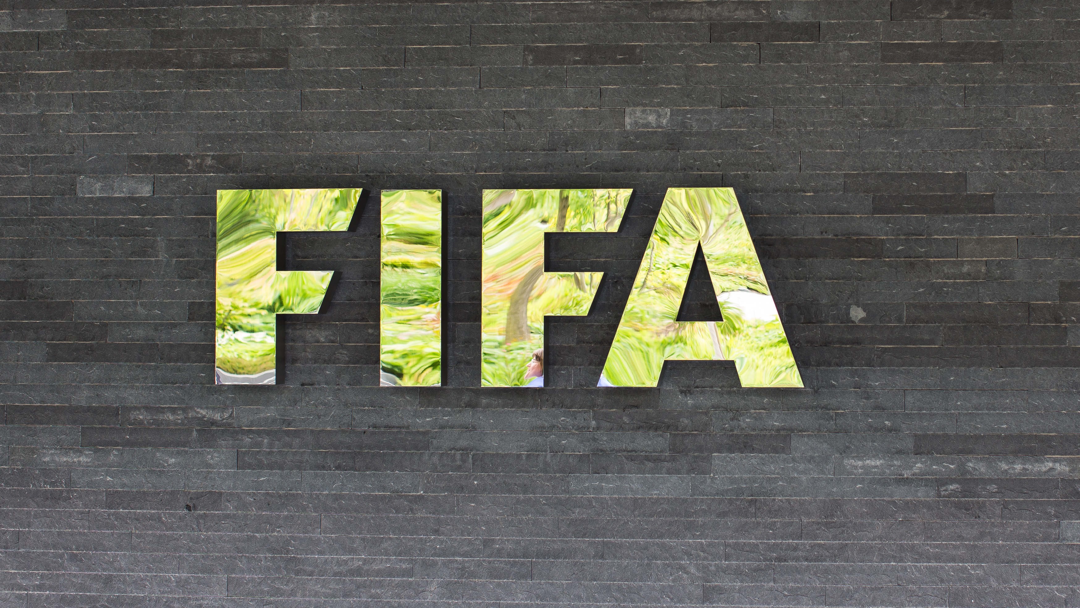Two Fifa officials arrested on suspicion of 'taking millions in bribes ...