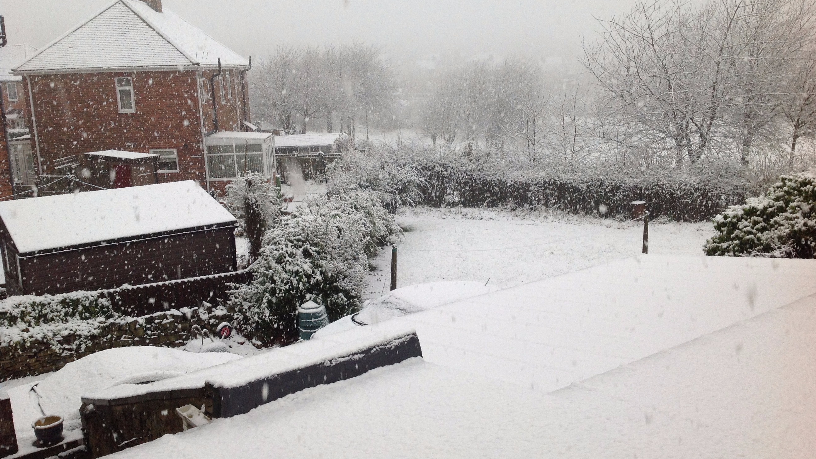 Snow falls thick and fast in the North East causing difficult driving ...