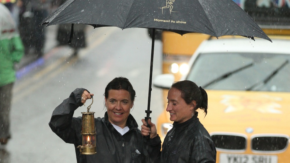 Olympic officials forced to halt Torch Relay due to wet weather in ...