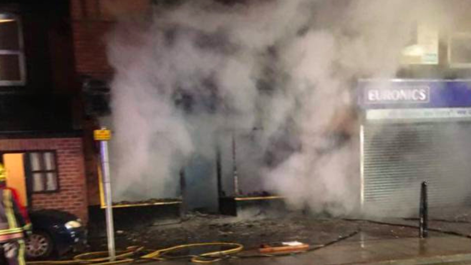 Two taken to hospital after ten rescued from burning building | ITV ...