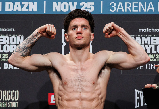 Boxer John Cooney remembered as 'our champion' as hundreds attend ...