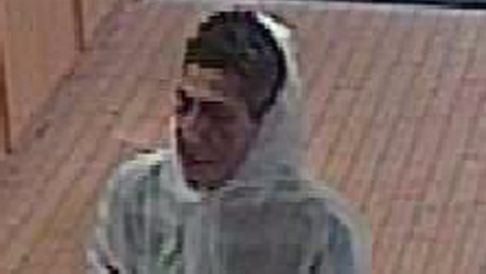 Police hunt knife-wielding female bank robber with purple hair | ITV News