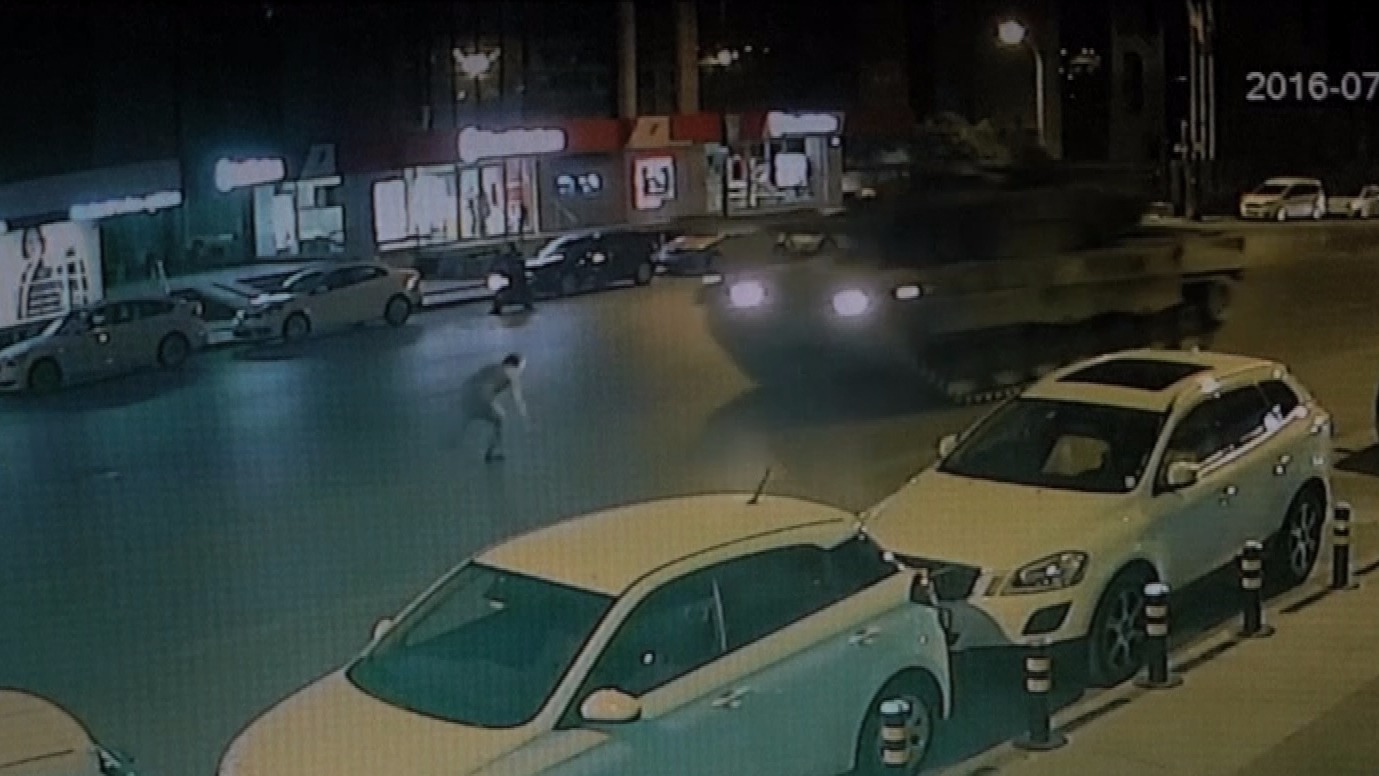 Man gets run over by tank twice - and survives | ITV News