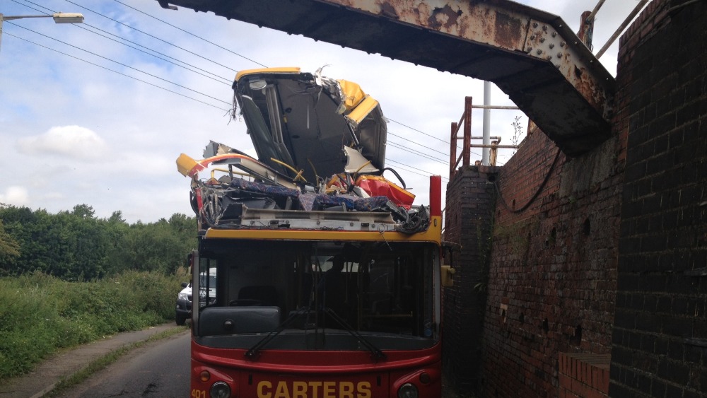 Bus crashes into railway bridge | ITV News Anglia