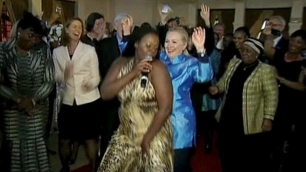 US Secretary of State Hillary Clinton shows off her dancing skills ...