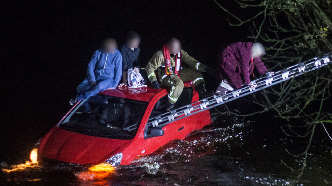Teens rescued after car gets stuck in river | UTV | ITV News