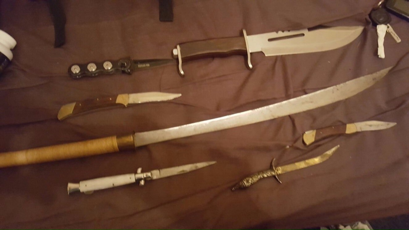 Deadly weapons, including samurai sword uncovered during raids that saw ...