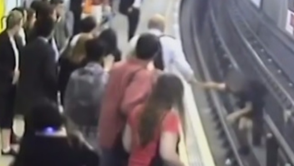 Man jailed for pushing a stranger onto Tube tracks seconds before a ...