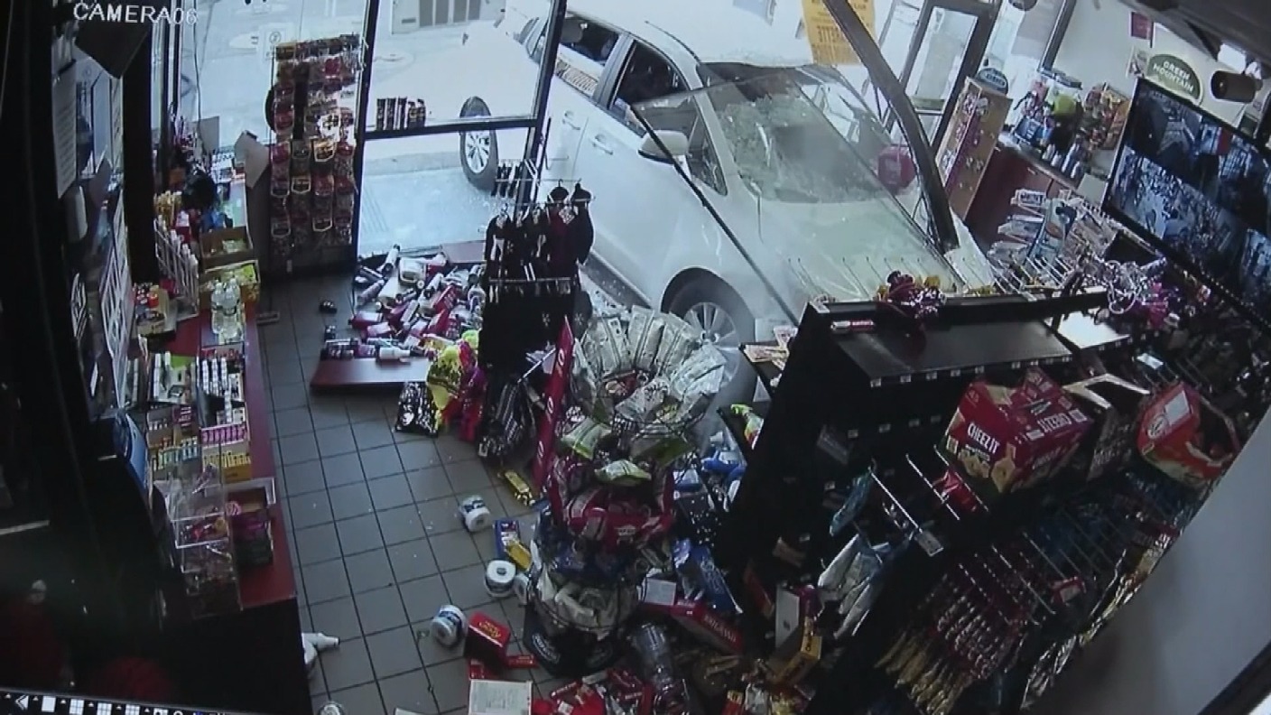 Dramatic video shows car crashing into shop and hitting customer | ITV News