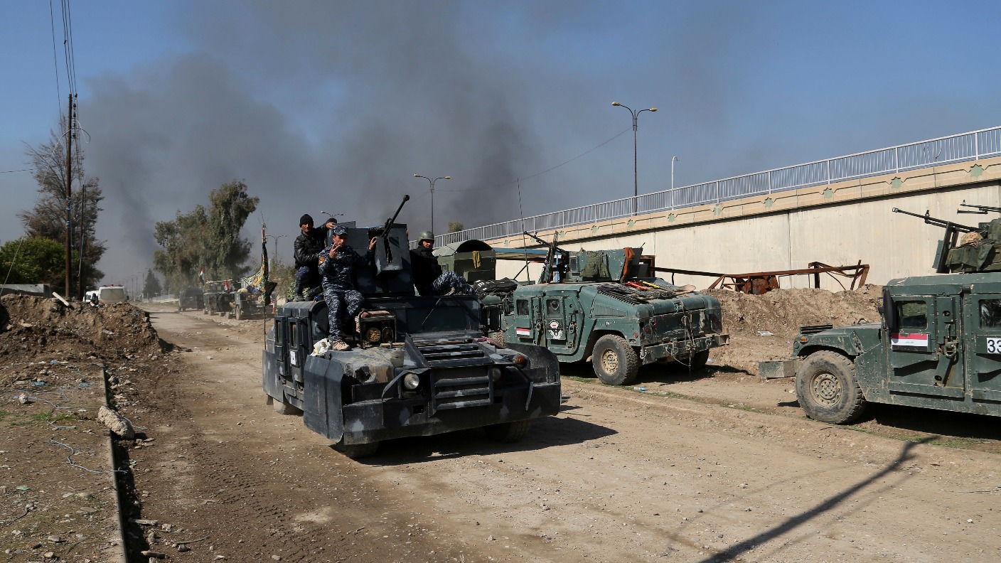Iraqi security forces take back control of Mosul's main government ...