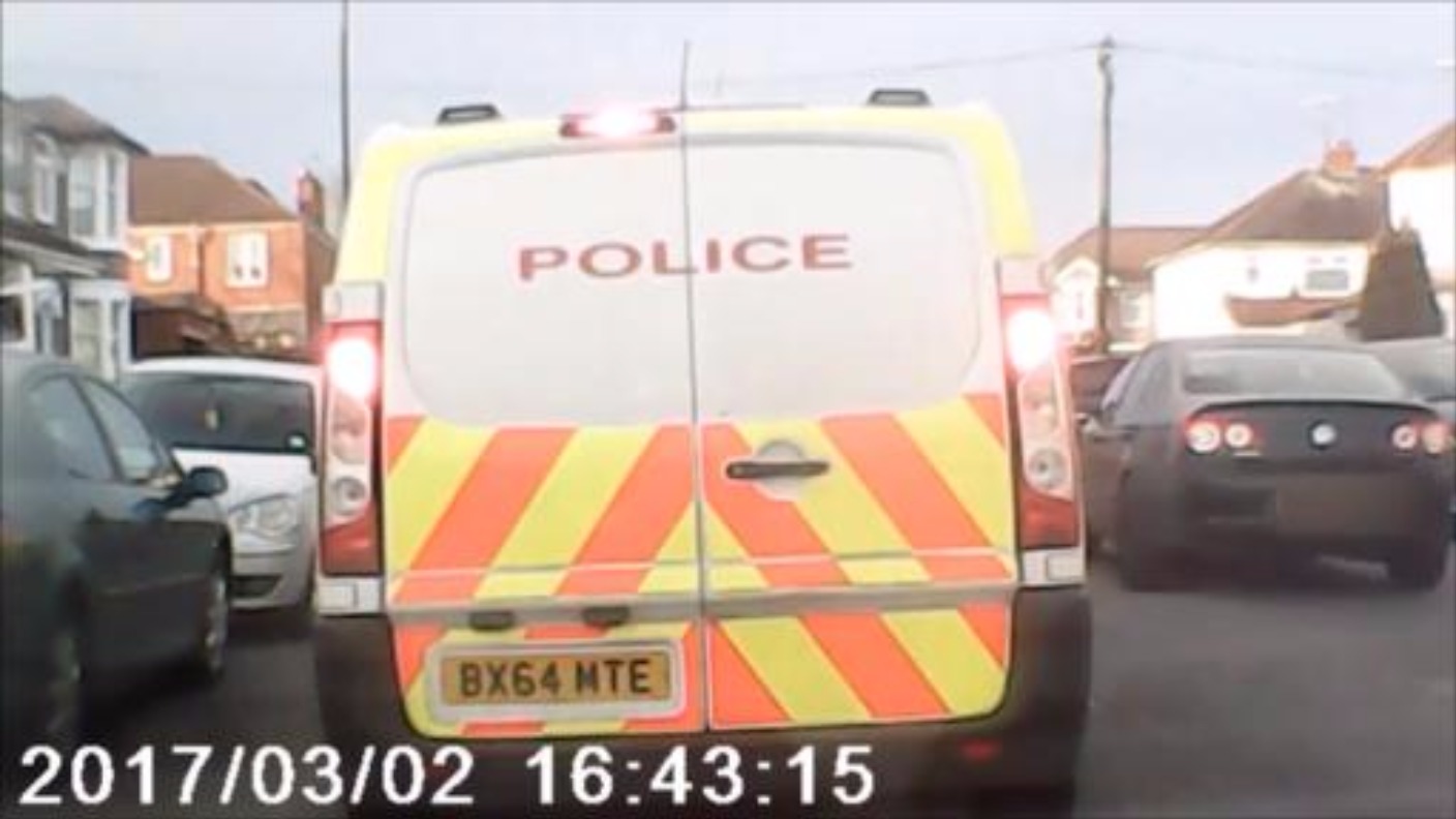 Driver overtakes queue of traffic in front of police | ITV News Central
