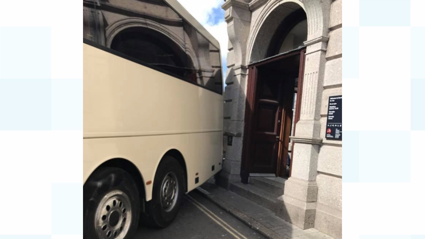 It's a tight squeeze for the coach driver who gets stuck in St Ives ...
