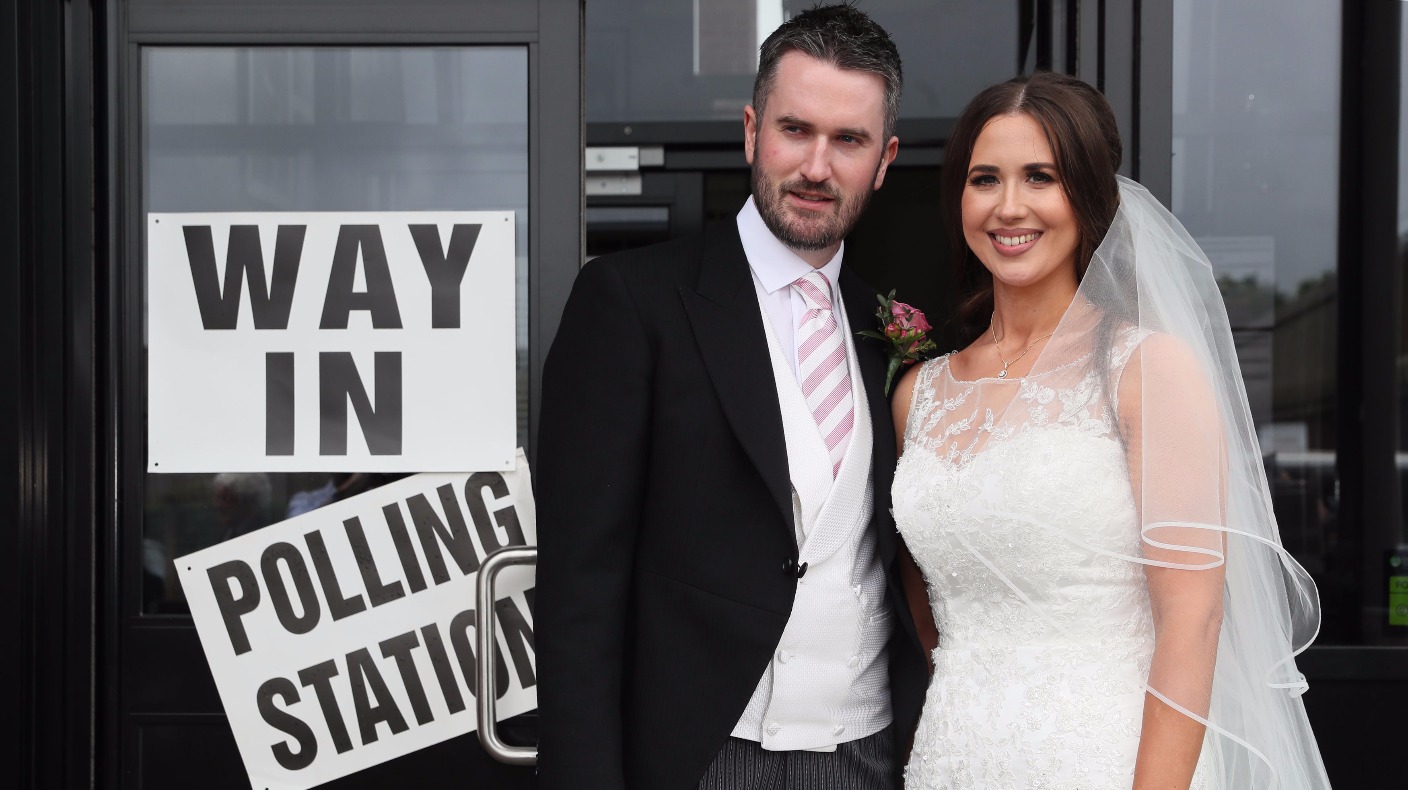 Prospective MP and new husband pause their wedding celebrations to vote ...