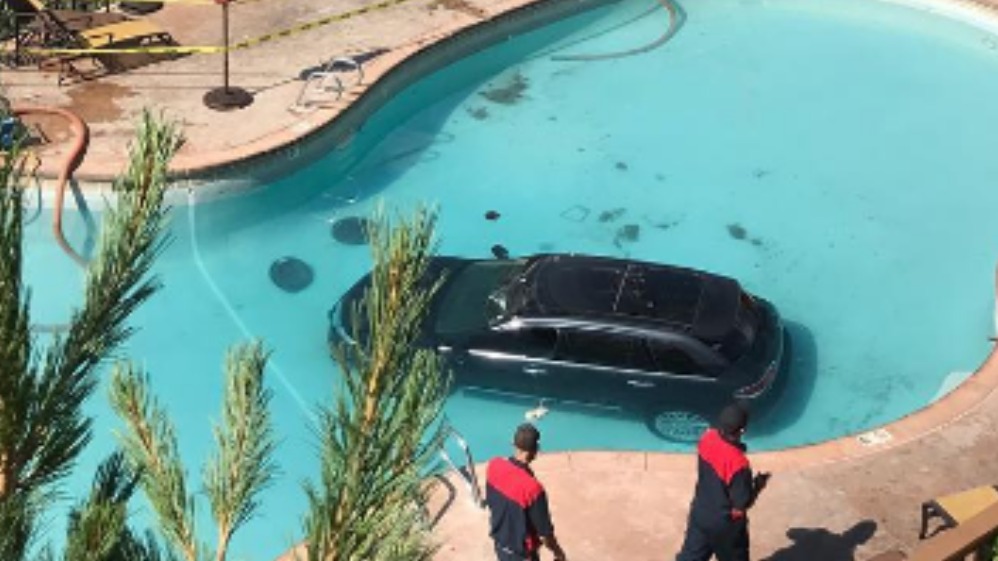 Car crashes into swimming pool after 'driver hits wrong pedal' | ITV News