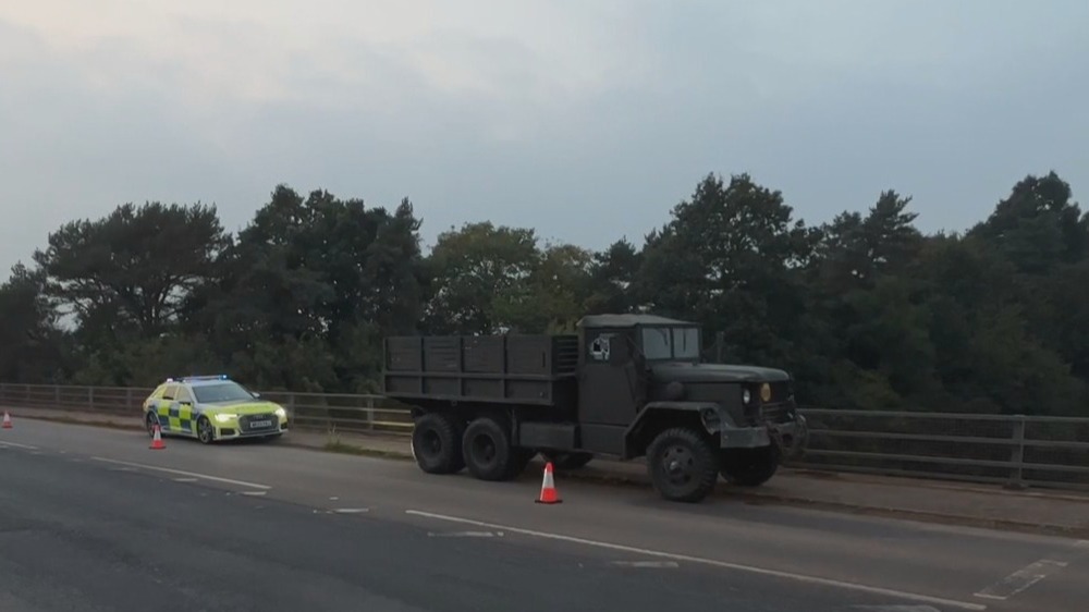Man charged after military truck 'driven through police roadblock' in ...