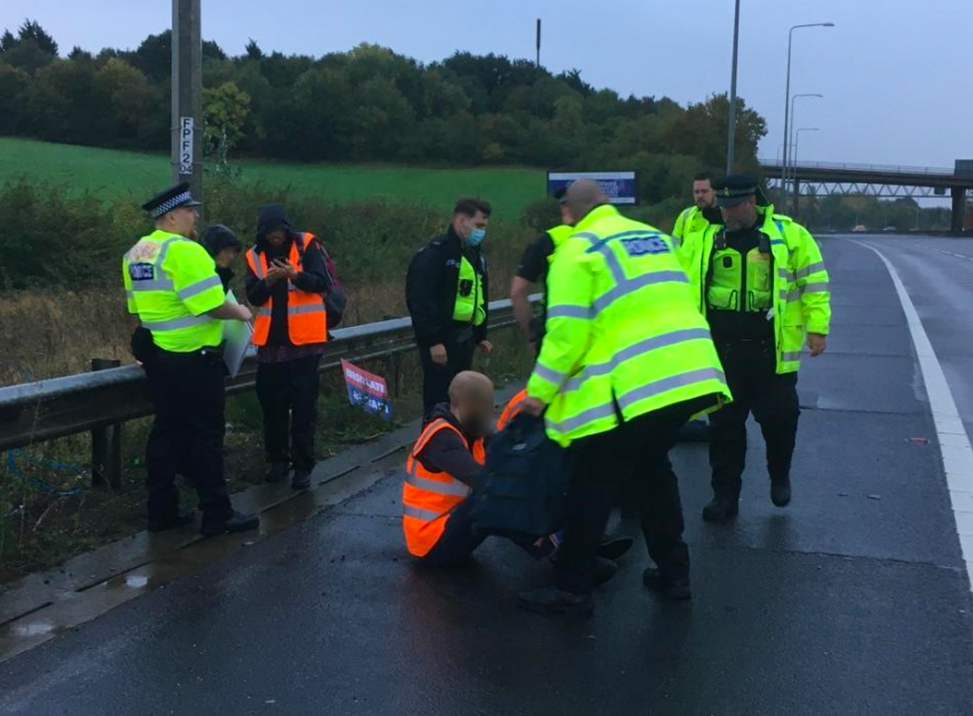 Ten arrested after protestors walk towards oncoming traffic on M25 ...