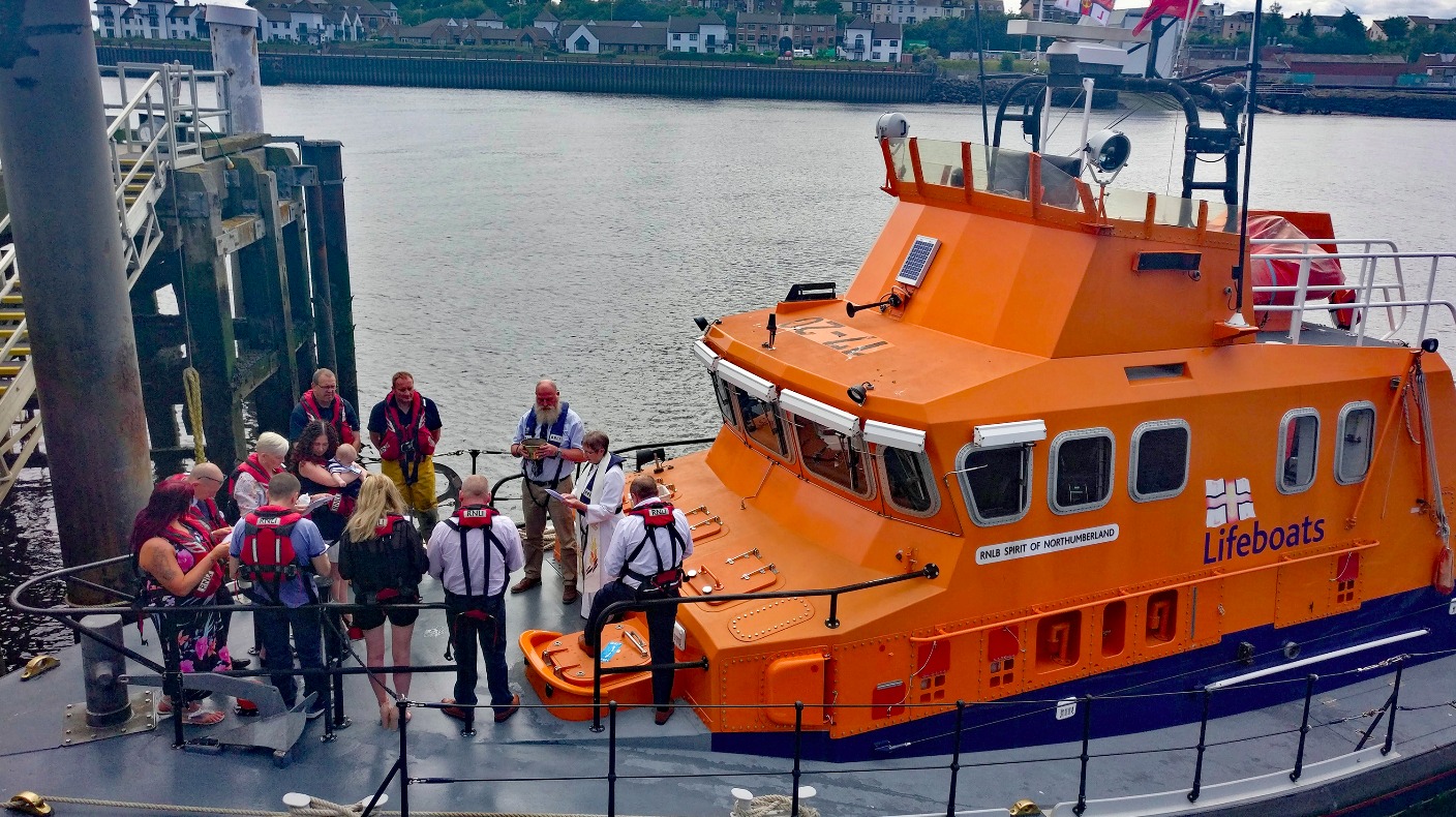 RNLI volunteer's son christened on Tynemouth lifeboat | ITV News Tyne Tees