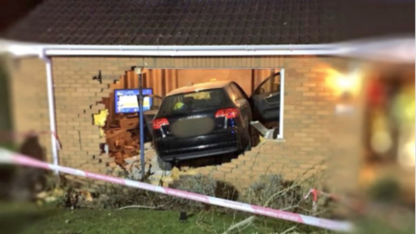 Two hurt after car crashes through house | ITV News Central