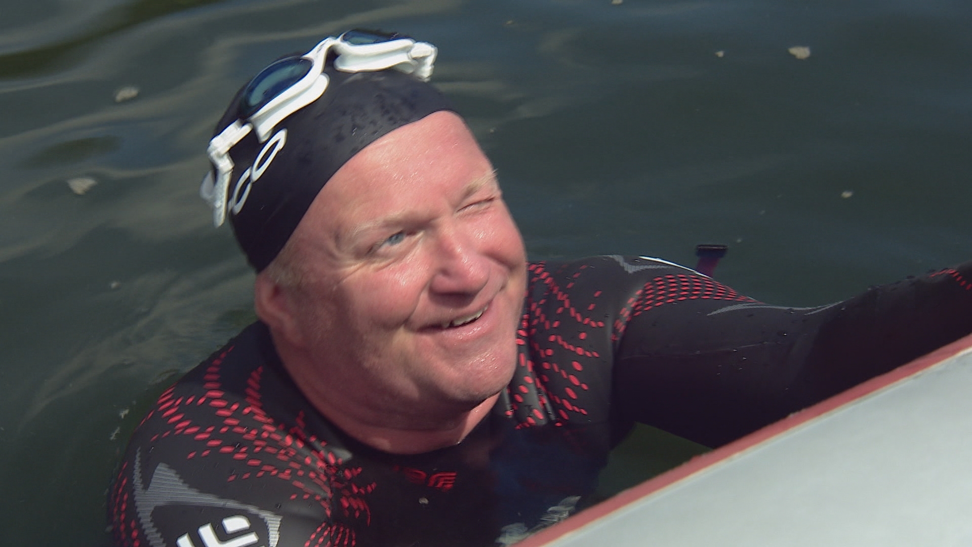 Triathlete who battled physical and mental health back in the water ...