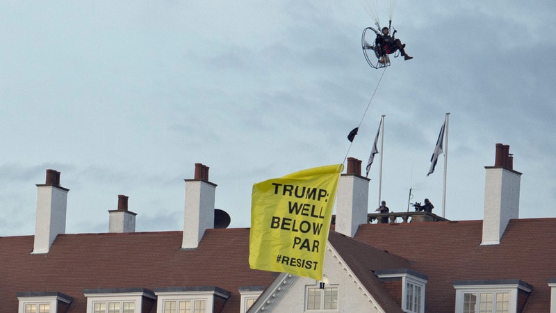 Man arrested in connection with Donald Trump paragliding protest at ...