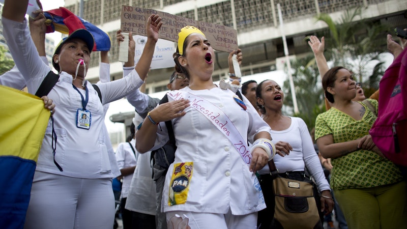 Doctors and nurses take to streets in Venezuela protests | ITV News